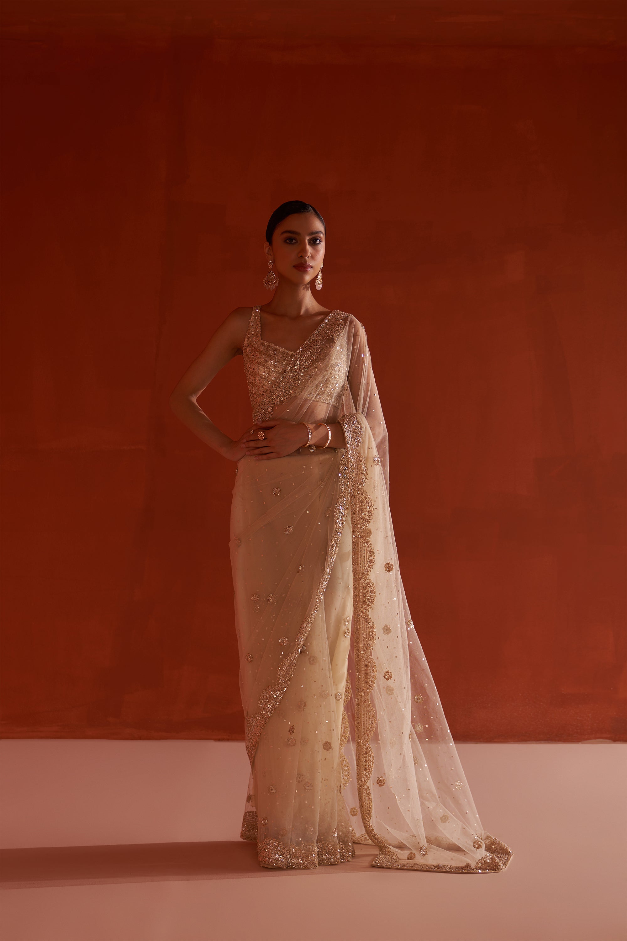 Elegant Gold Net Saree with Pearl and Crystal Embellishments – Karegar