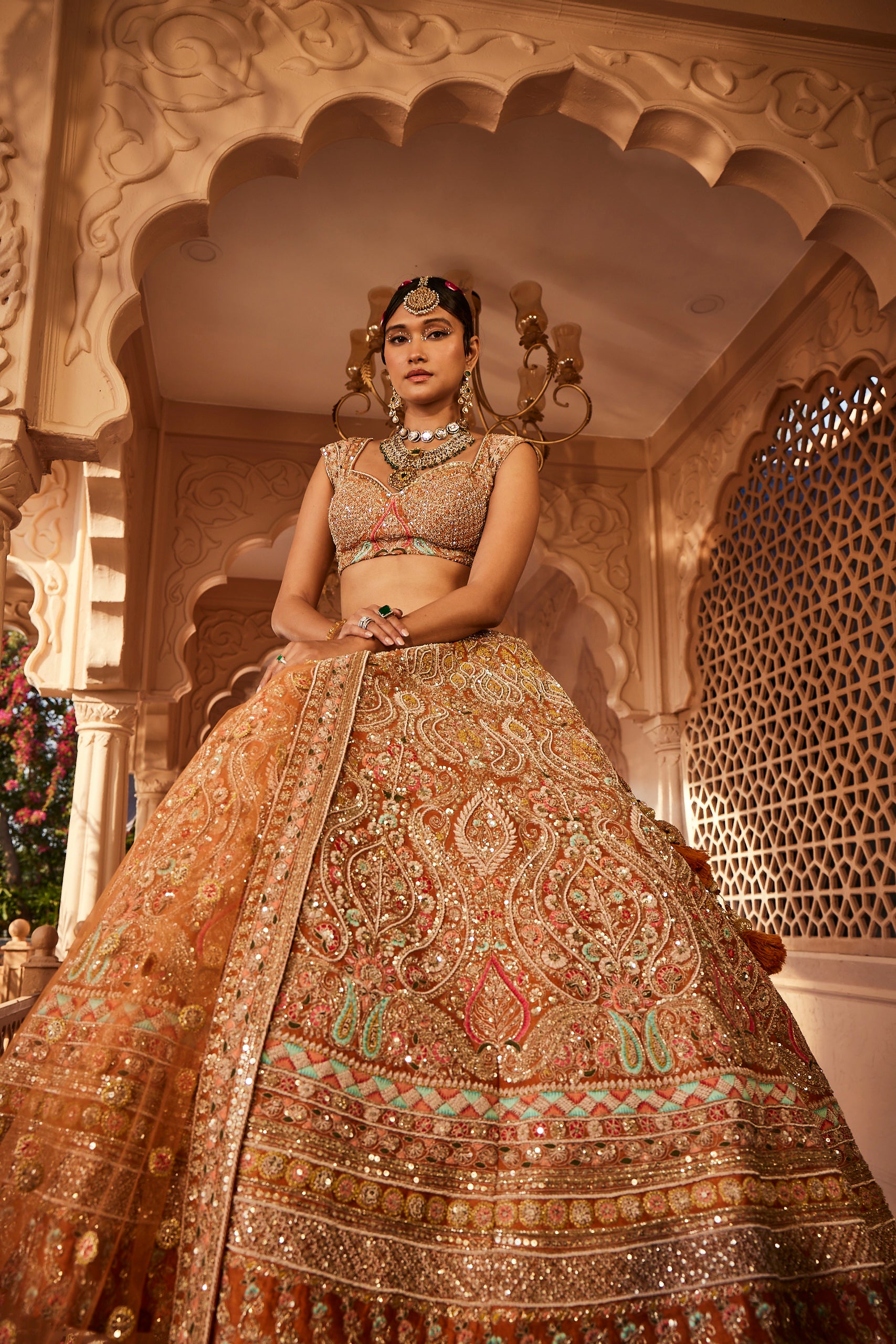 Hand-Embroidered Rust Lehenga with Net Dupatta – Karegar