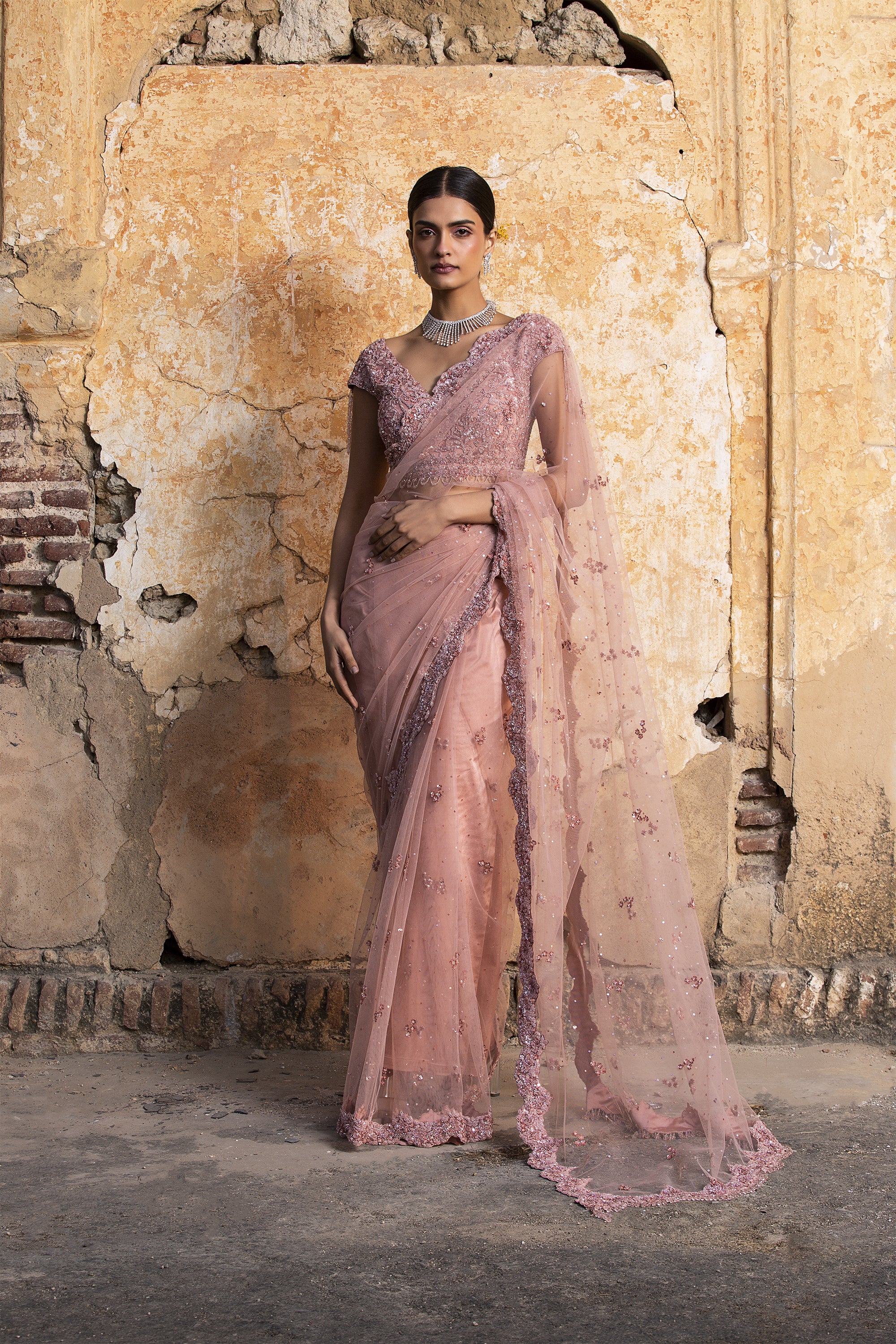 Stunning Rose Pink Net Saree with Intricate Beadwork and Crystals – Karegar